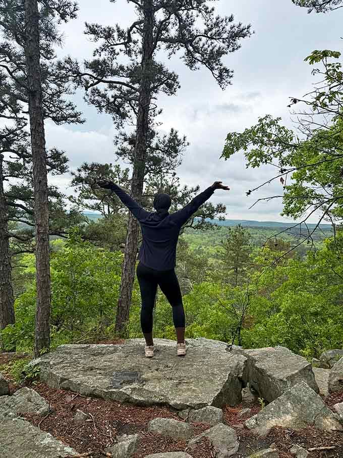 Arms raised in victory because you just discovered Missouri's secret weapon against vacation FOMO.