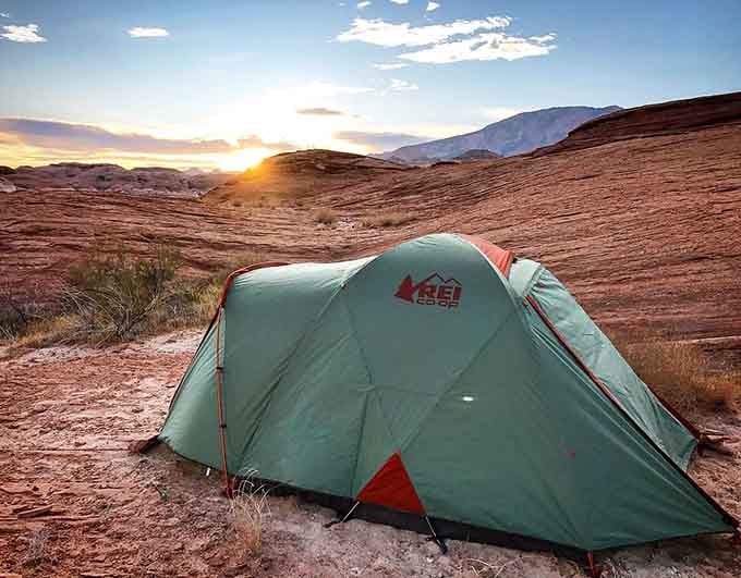 Camping under desert stars after a day on the water, because some adventures deserve encores.