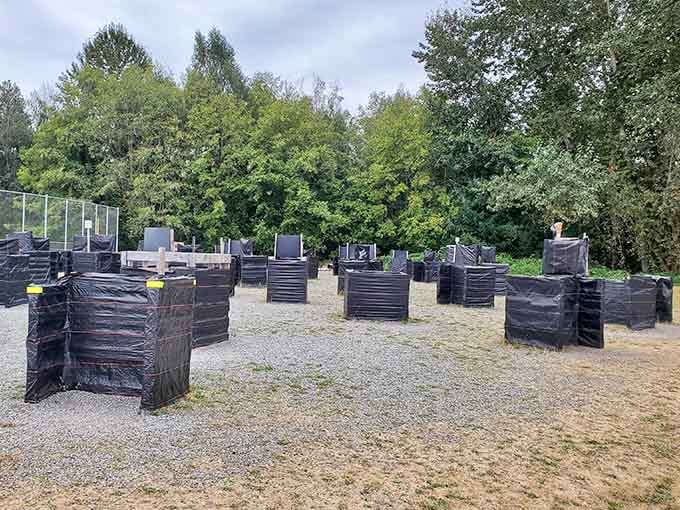 Strategic barriers create an outdoor arena where friendly competition meets questionable aim and maximum entertainment.