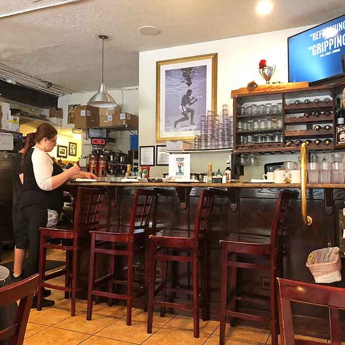 The counter seats offer front-row views of the breakfast magic happening, where eggs meet destiny in real time.