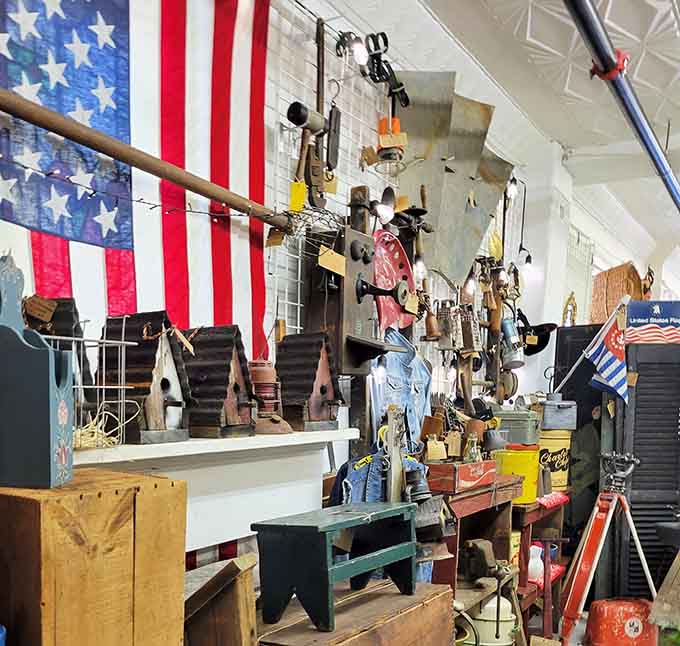Americana meets nostalgia under that flag, creating a patriotic time capsule of tools, toys, and forgotten treasures.