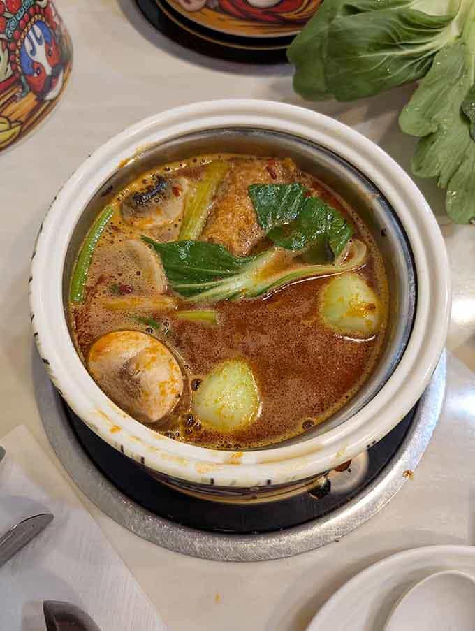 Bubbling broth filled with treasures, this is comfort food that requires a little work but delivers maximum satisfaction always.