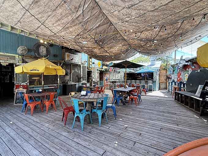 The outdoor patio with colorful chairs where island breezes make every meal taste even better.