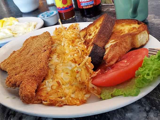 Catfish for breakfast with hash browns and Texas toast is the kind of creative thinking that makes mornings worth celebrating.