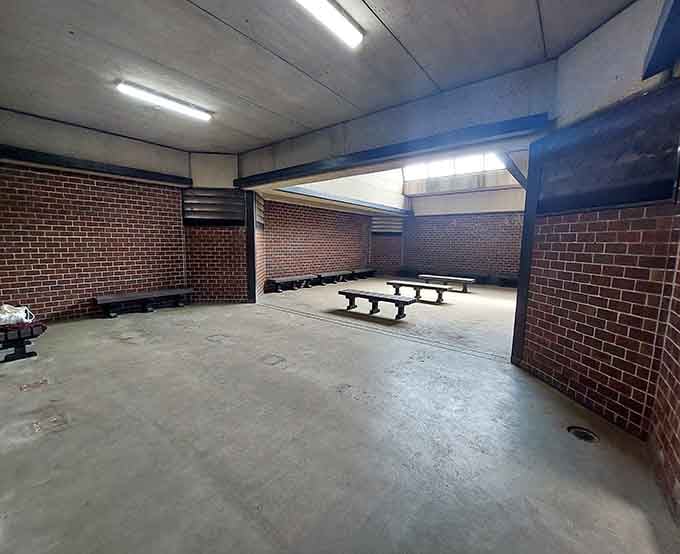 Inside the bathhouse where changing happens without the usual beach facility horror show experience.