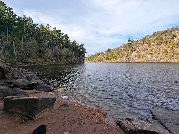 Peaceful shoreline where you can skip stones across water that's been flowing since forever began.