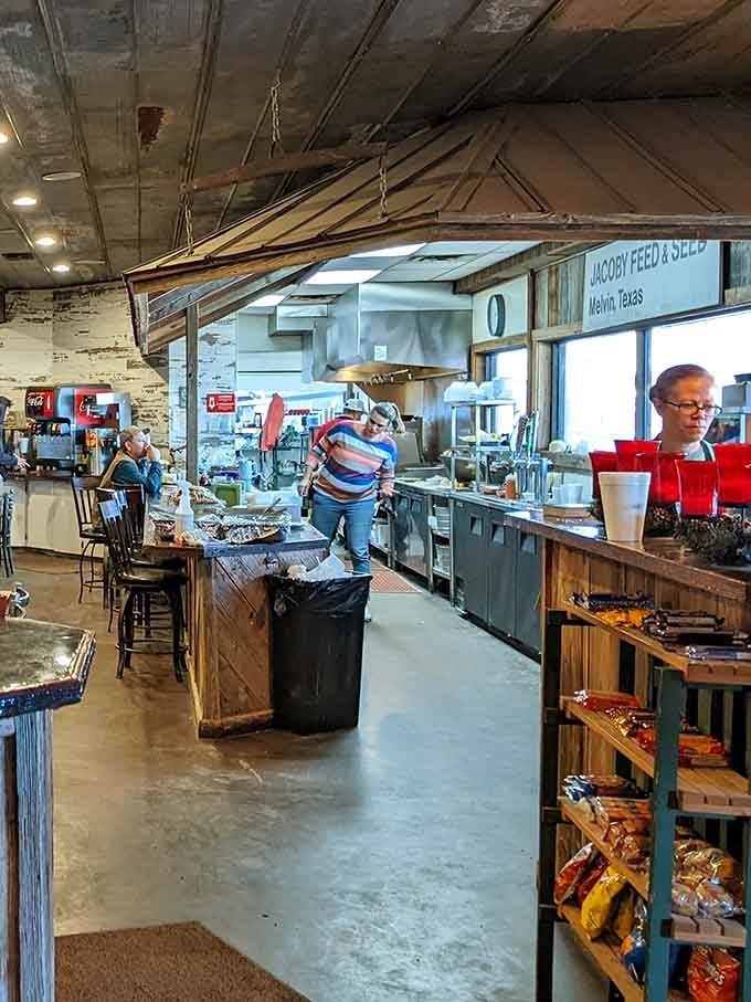 Counter seating with a kitchen view lets you watch the magic happen while contemplating your excellent life choices.
