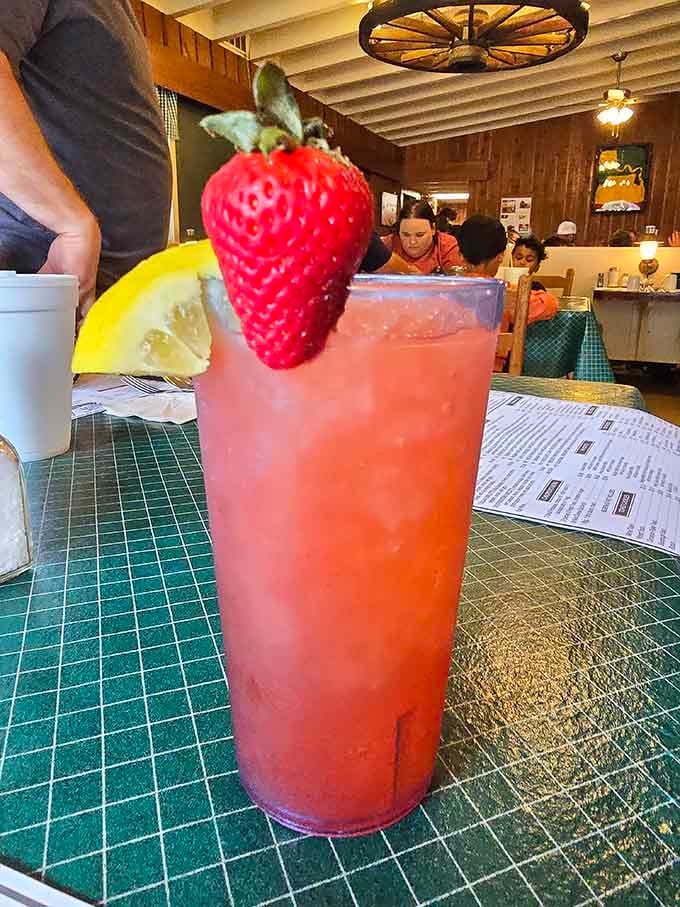 Strawberry lemonade garnished like it's attending a fancy garden party, bringing unexpected elegance to your pancake feast.
