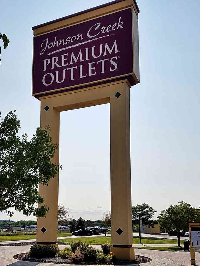 The towering sign stands proud like a beacon of bargains, visible from the highway and calling to deal-seekers everywhere.