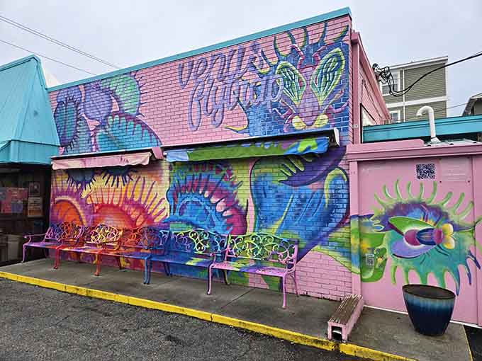 That vibrant mural outside adds extra flavor before you even taste the food, pure beachside artistic joy.