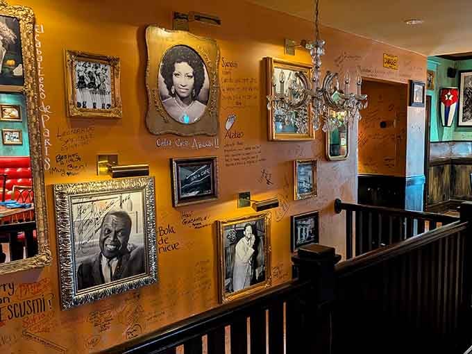 Vintage photos and memorabilia cover the walls, turning dinner into a visual journey through Cuban cultural history.