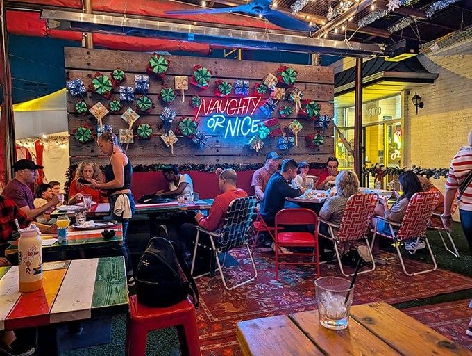 The "Naughty or Nice" neon says it all, everyone's welcome at this year-round Christmas celebration.