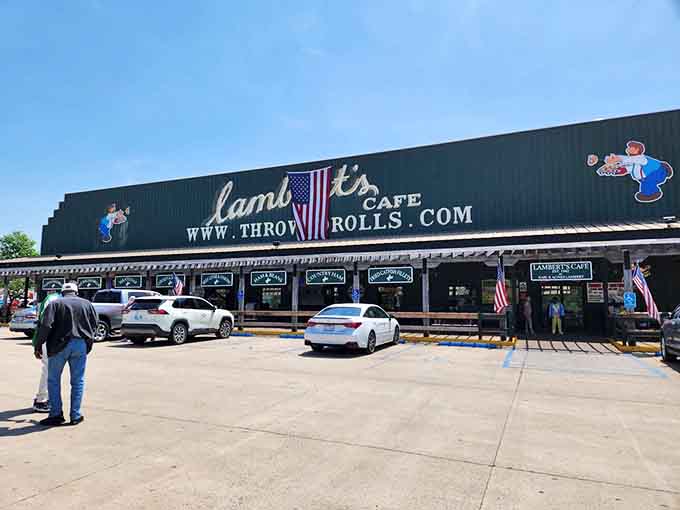 The green building stands proud under blue skies, its famous URL promising an experience you'll be telling your neighbors about for weeks.