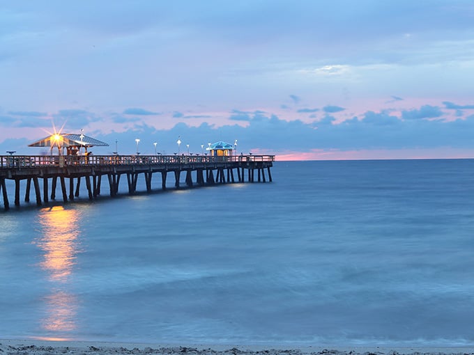The pier at twilight looks like something from a postcard your aunt would send in the 1970s.