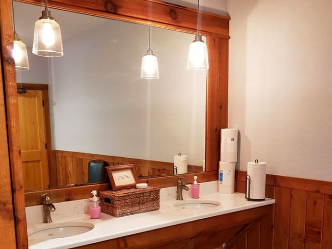 Even the restrooms get the rustic-chic treatment, proving attention to detail extends throughout this charming establishment.