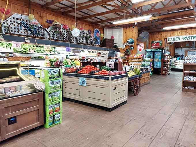 The farm market interior showcases fresh produce displays that make grocery stores look sad and fluorescent by comparison.
