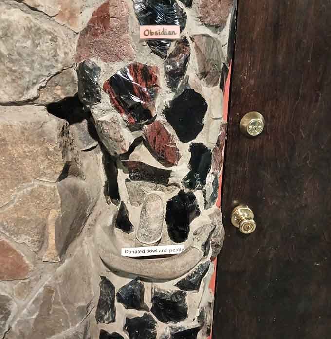 Obsidian embedded in the walls, sharp enough to remind you that nature doesn't mess around.