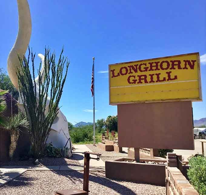 That cheerful yellow sign means business, announcing steaks and good times to everyone cruising down Interstate 19.