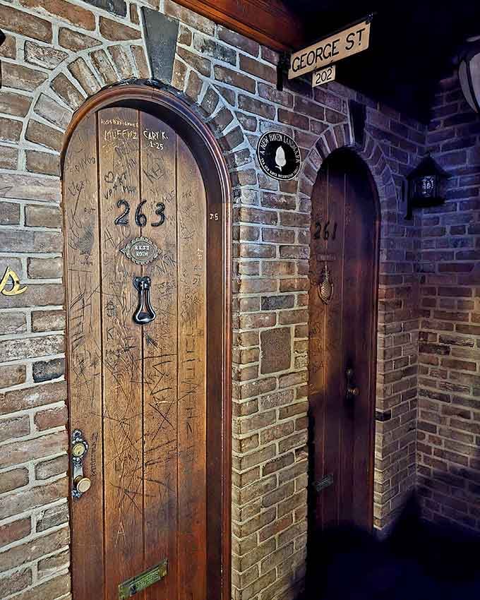 Even the restroom doors look like they belong in a speakeasy, adding character to every aspect of visiting.