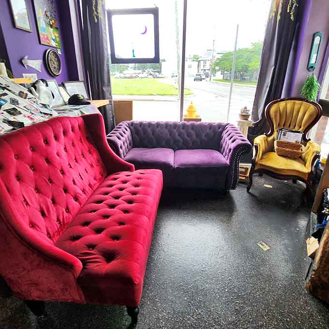 Velvet couches in jewel tones invite you to sink in and stay awhile, maybe with a book or friend.