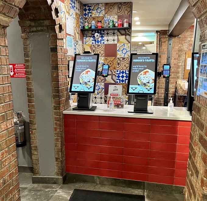 Self-service kiosks meet traditional tile patterns, showing how old-world flavors adapt beautifully to modern convenience perfectly.