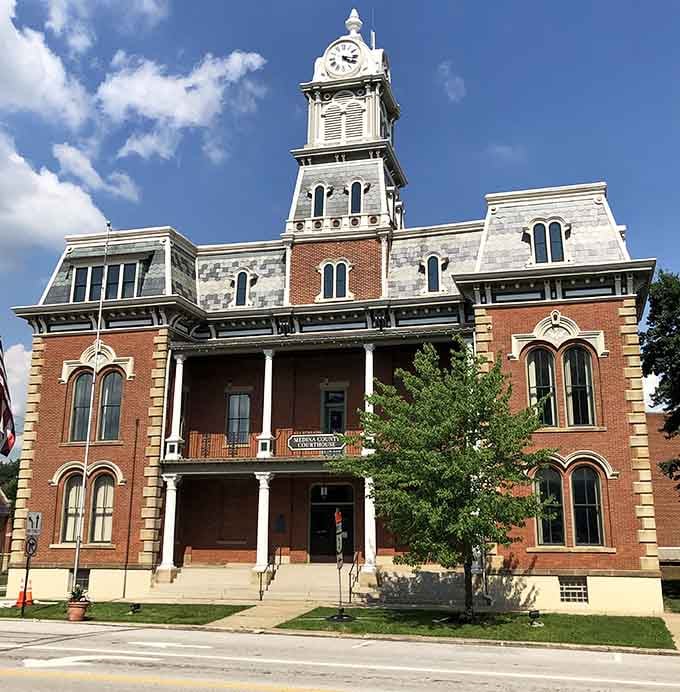 The courthouse anchors the square like a Victorian-era masterpiece that refuses to be ignored or forgotten.
