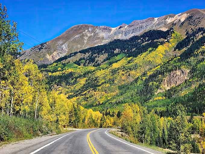 Golden aspens line the road like nature's own parade route, celebrating your arrival with the best confetti money can't buy.