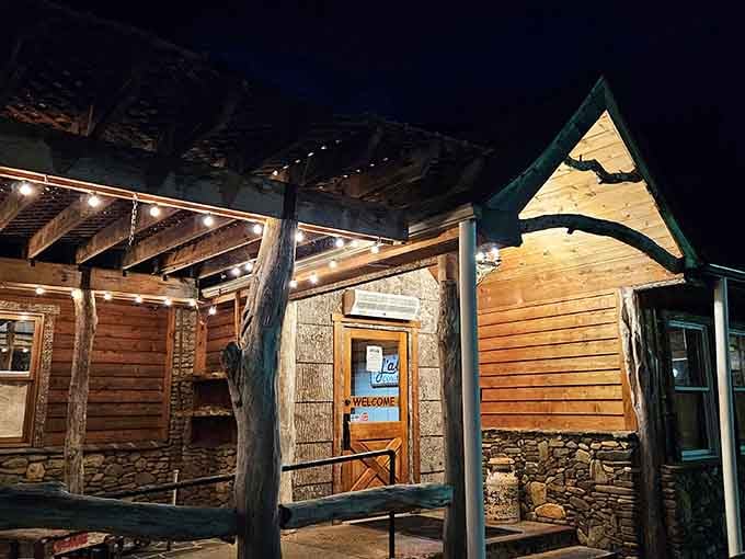 The welcoming entrance at night glows like a beacon for hungry travelers who've made the worthwhile mountain journey.