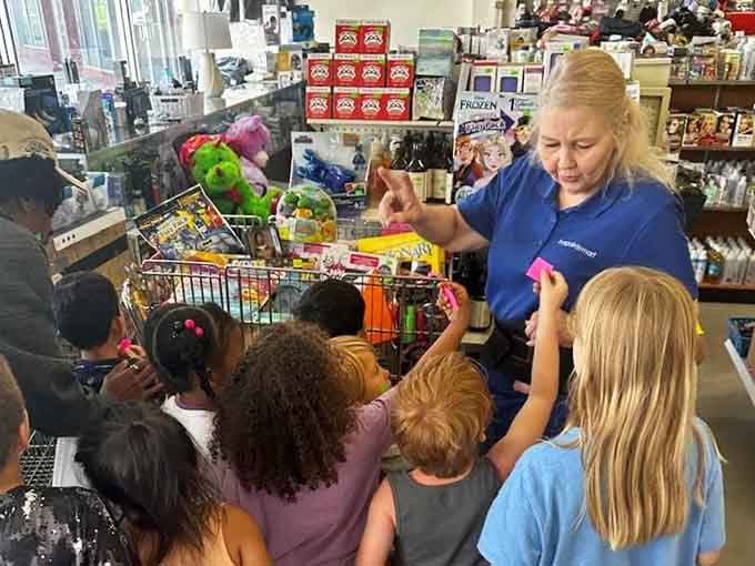 Friendly staff helping young shoppers discover deals, creating the next generation of bargain-hunting champions and budget wizards.