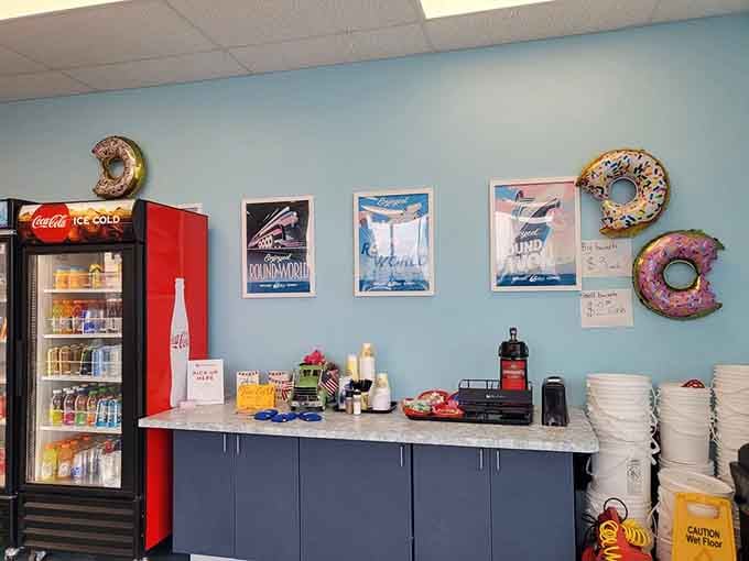 Giant donut art on the walls reminds you that this place takes its craft seriously, even playfully.
