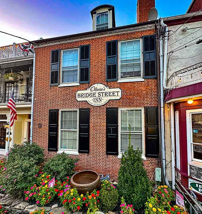 Olivia's Bridge Street Inn blooms with flowers, offering hospitality in a building that's seen centuries of travelers come and go.