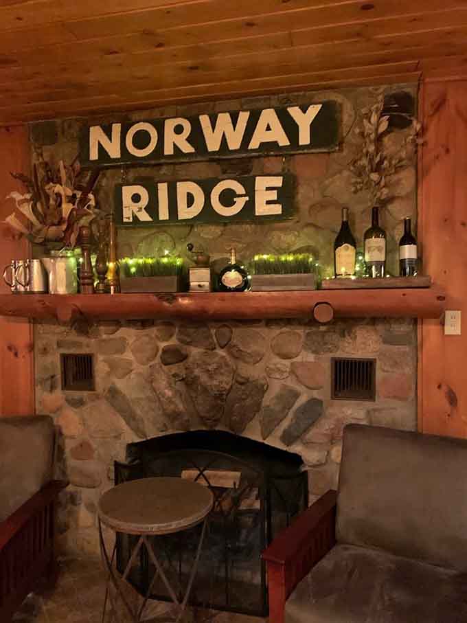 That stone fireplace with the Norway Ridge sign creates a cozy focal point, perfect for lingering over coffee and conversation.