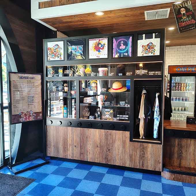 Exclusive collectibles line the display case like treasure in a captain's quarters, from straw hats to character figurines.