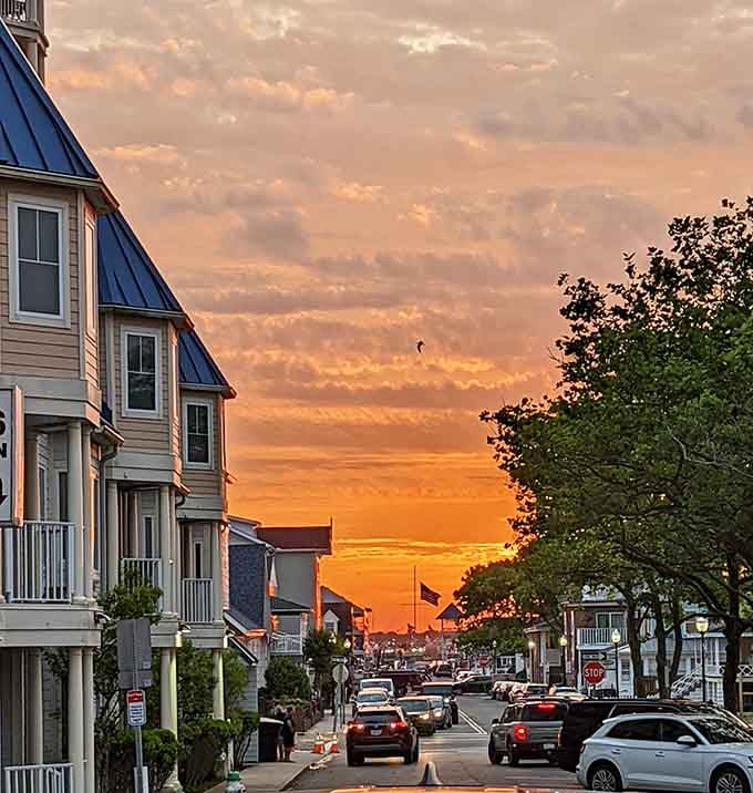 Downtown streets glow orange and pink as the sun sets, painting ordinary buildings in extraordinary evening light.