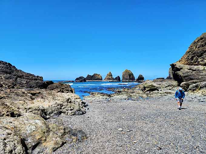 The secret beach beyond the tunnel rewards the brave with solitude, rocks, and the satisfaction of finding something special.