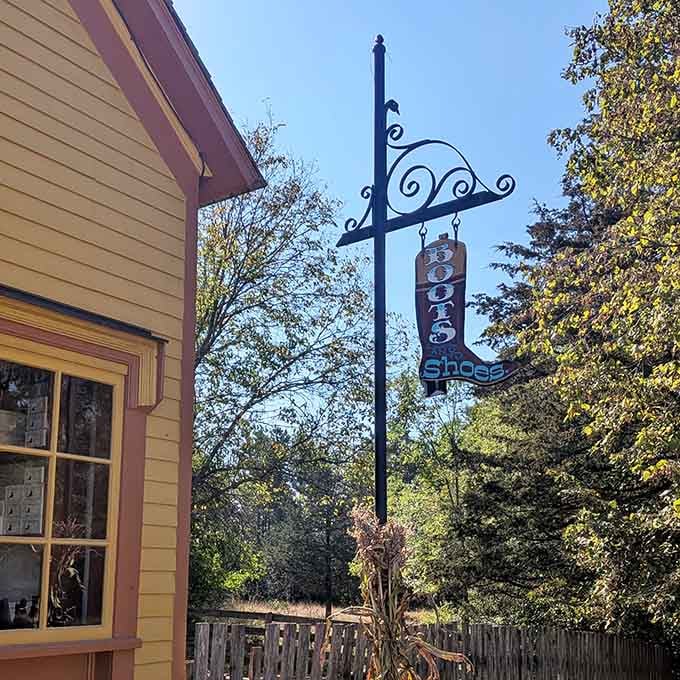 That ornate boot sign announces quality footwear crafted when cobblers knew your feet personally and shoes lasted actual decades.