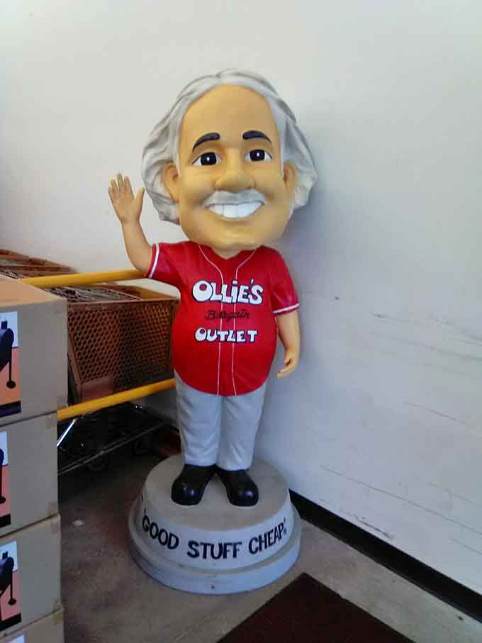The store mascot welcomes you with open arms and promises of savings beyond belief.