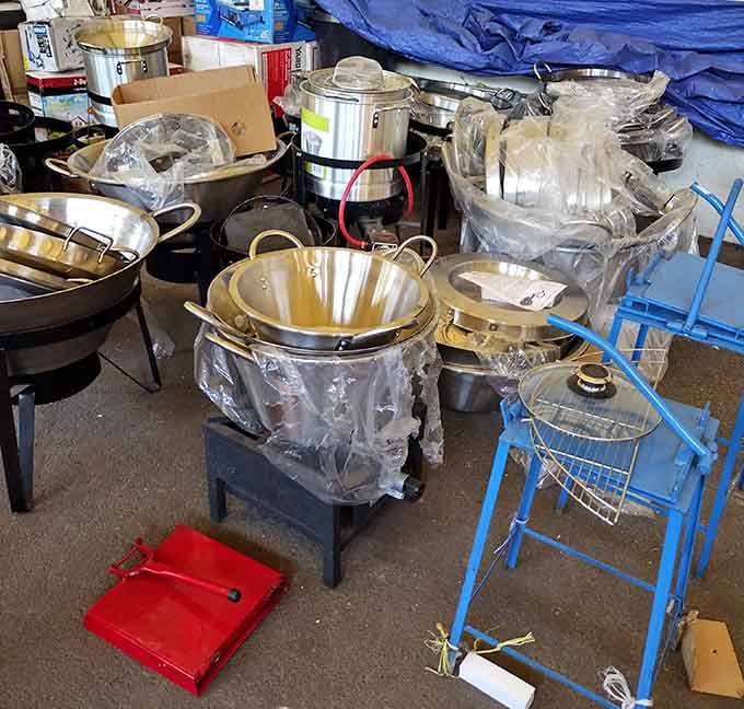 Shiny cookware stacked and ready to transform your kitchen into the culinary command center you've always dreamed about.