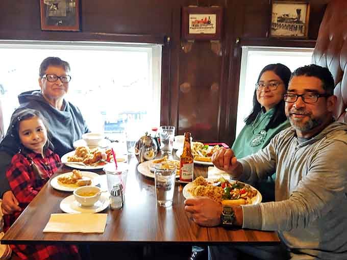 Families gather in the cozy train car booths, sharing plates of Thai favorites and making memories in this one-of-a-kind setting.