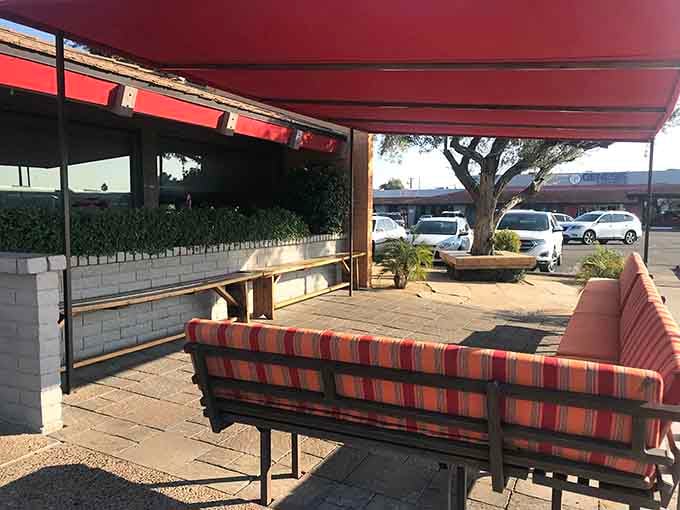 Outdoor seating with striped cushions for those perfect Arizona mornings when breakfast tastes better under open skies.