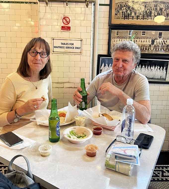 The universal expression of people who've just realized their fish sandwich is significantly larger than they'd mentally prepared for.