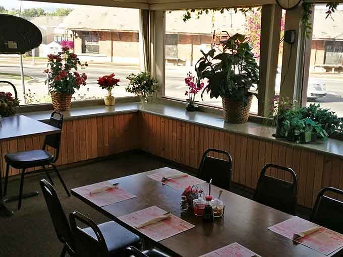Window seats with flowers create a surprisingly cheerful backdrop for your inevitable food-induced happiness coma.