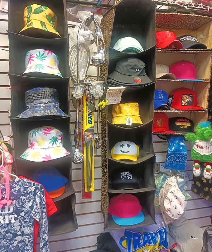 Bucket hats arranged in perfect rows, from tropical prints to solid colors, ready for any adventure ahead.