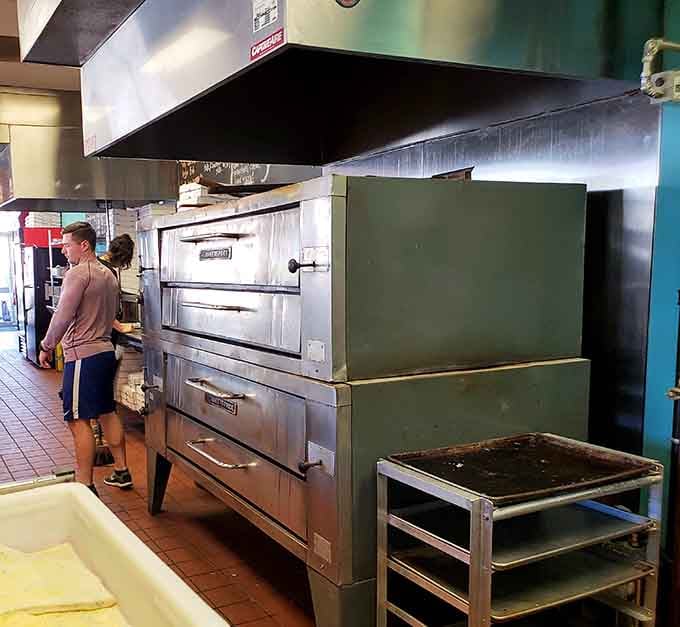 Watching the pizza-making process unfold is like dinner theater, except the finale is something you actually get to eat.