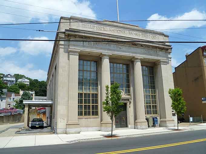 The grand Phillipsburg National Bank building stands as a neoclassical monument to when banks actually looked important.