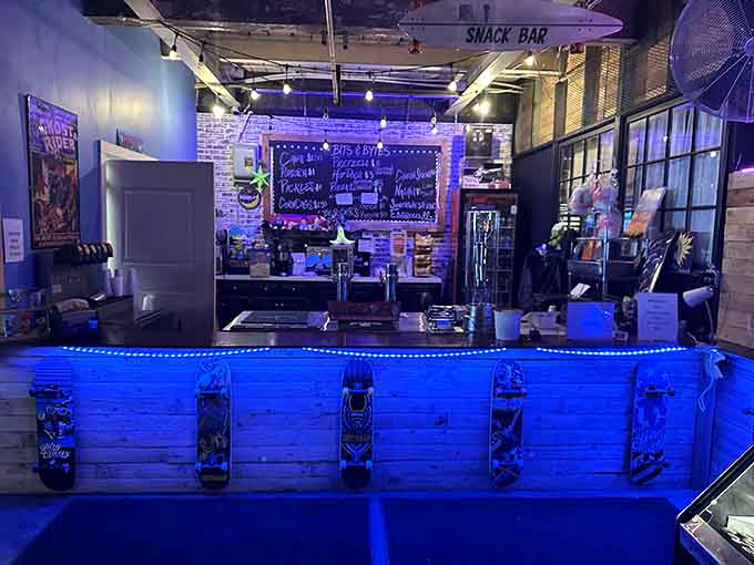 The bar area glows with personality, offering refreshments to fuel your gaming marathon in serious style and comfort.