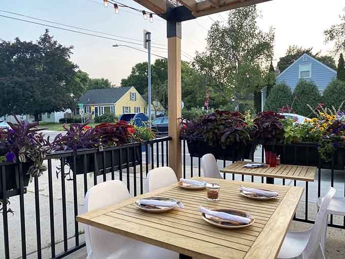 The patio offers front-row seats to perfect evenings, complete with string lights and stellar pizza.
