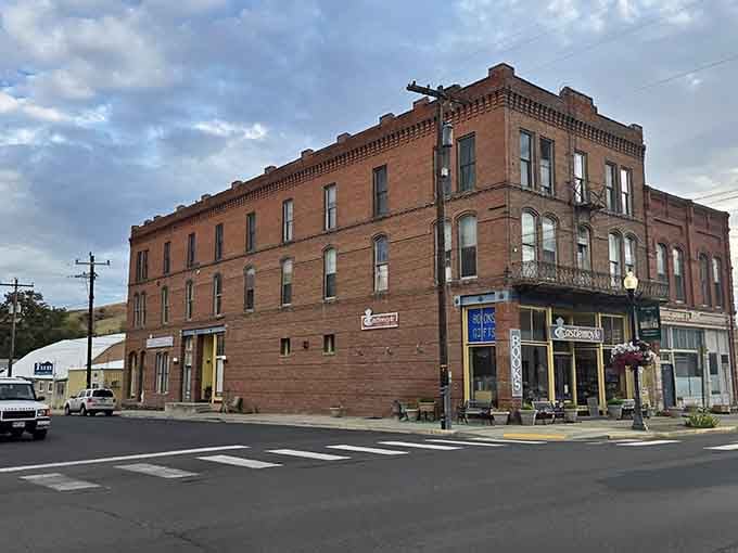Corner buildings display ornate brickwork craftsmanship that modern construction couldn't replicate if it tried, which it doesn't.