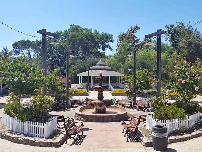 The park's central plaza features a charming gazebo and fountain, perfect for post-train-ride picnics and relaxation.