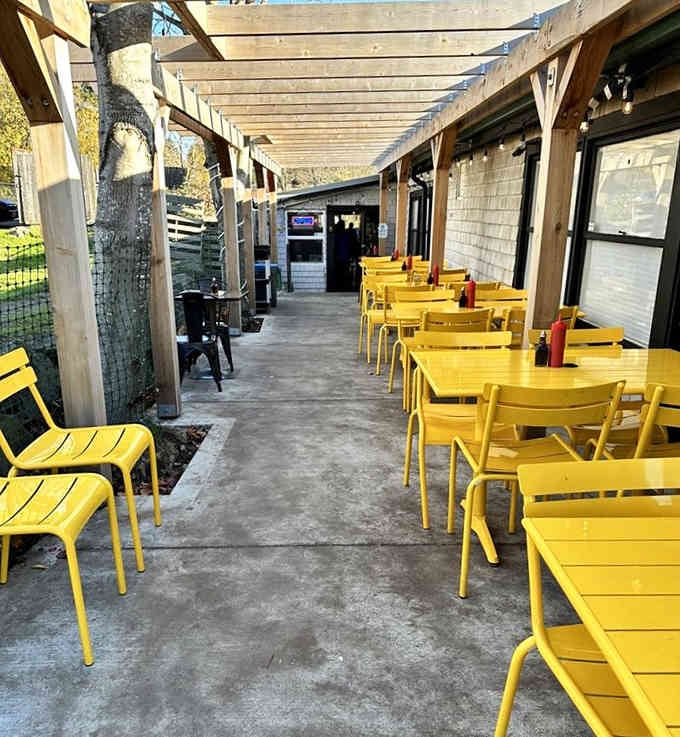 The sunny yellow patio furniture practically begs you to sit down and enjoy your meal al fresco style.